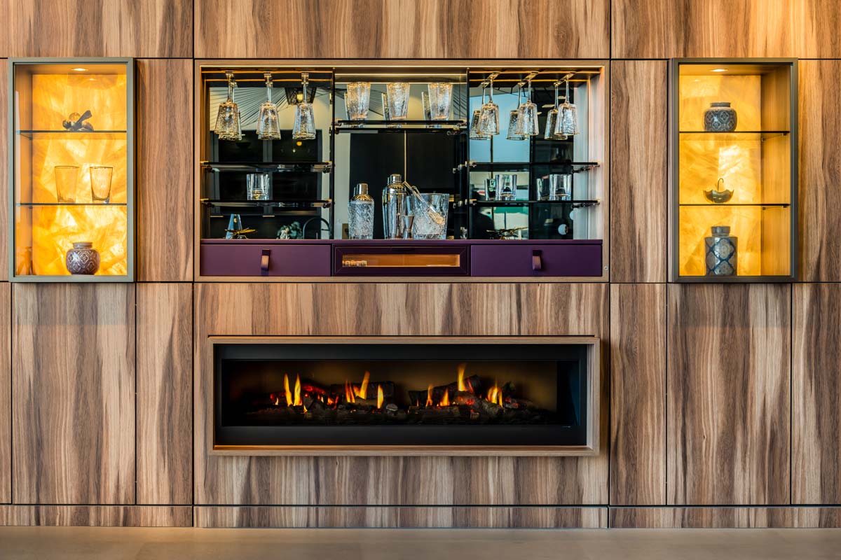 Bespoke Entertainment Centers that Integrate Discreet Bar Cabinets